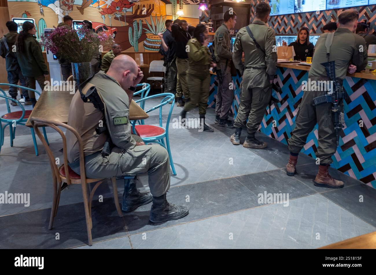 South Israel, Israel. 01st Jan, 2025. Israeli soldiers carry their ...