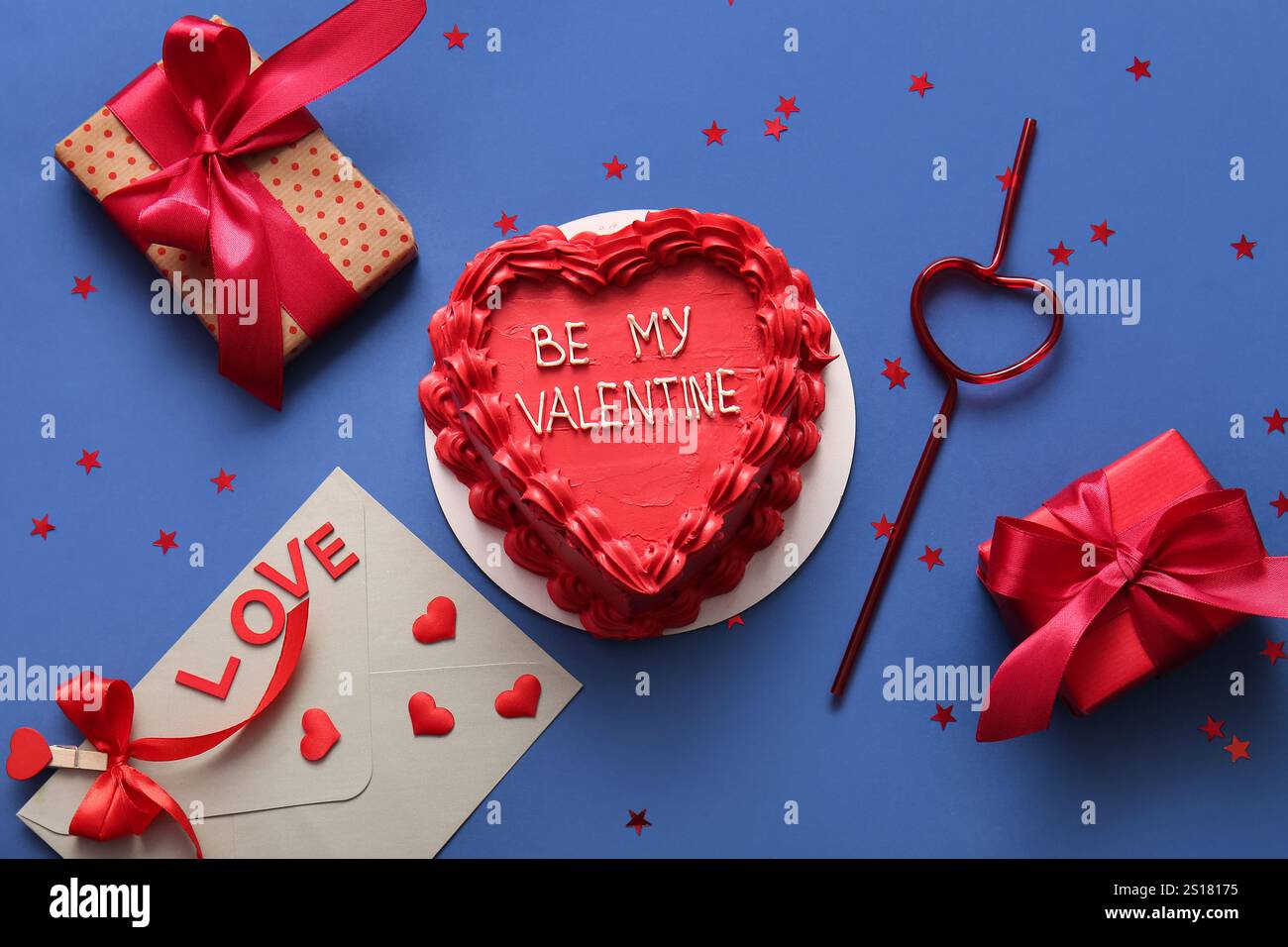 Sweet bento cake with gift boxes and envelope on blue background ...