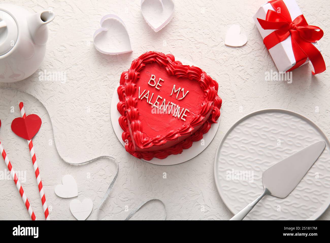 Sweet bento cake with gift box and teapot on white background ...