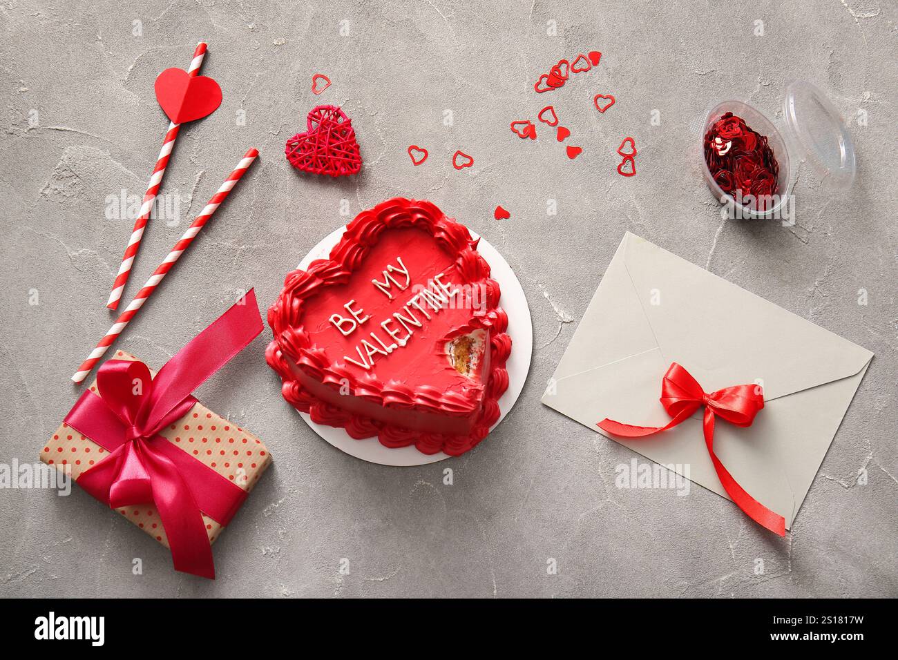 Sweet bento cake with gift box and envelope on grey background ...