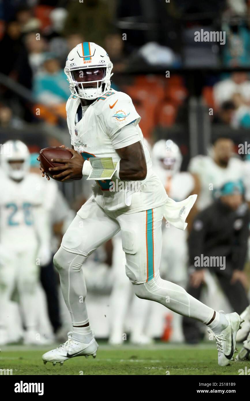 Miami Dolphins quarterback Tyler Huntley (18) looks to throw the ball ...