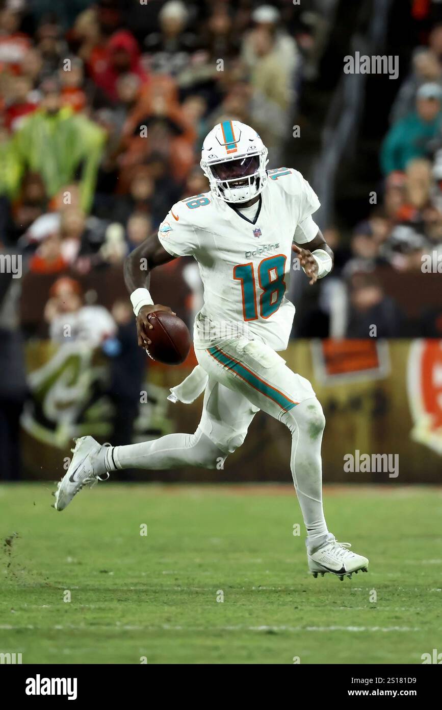 Miami Dolphins quarterback Tyler Huntley (18) runs with the ball during ...