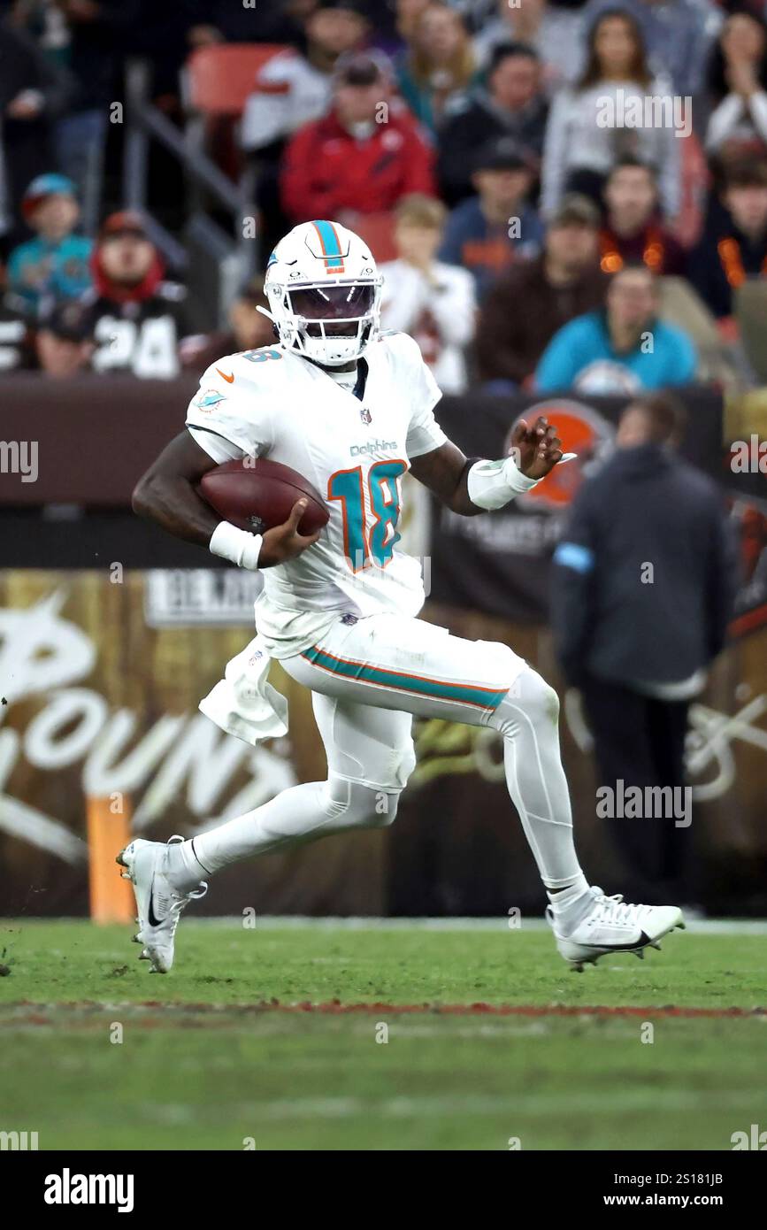Miami Dolphins quarterback Tyler Huntley (18) runs with the ball during ...