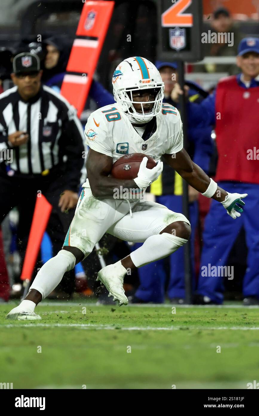 Miami Dolphins wide receiver Tyreek Hill (10) runs with the ball during ...