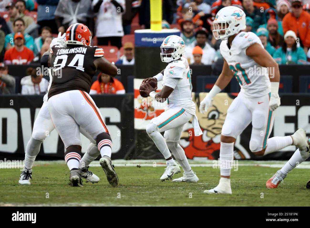 Miami Dolphins quarterback Tyler Huntley (18) looks to throw the ball ...