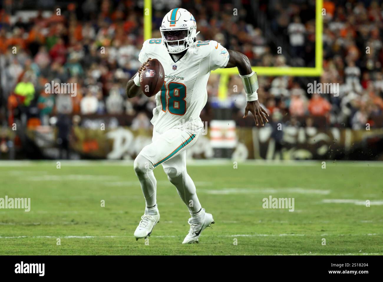 Miami Dolphins quarterback Tyler Huntley (18) runs with the ball during ...