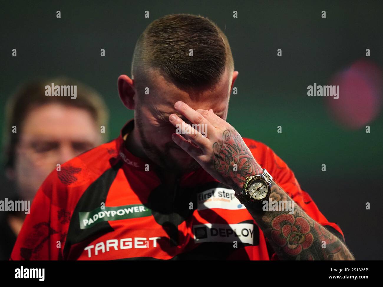 Nathan Aspinall reacts to going two sets down in the quarter-final ...