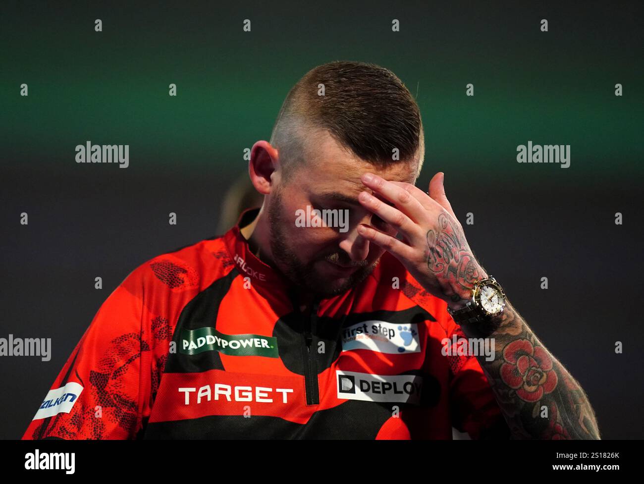 Nathan Aspinall reacts to going two sets down in the quarter-final ...