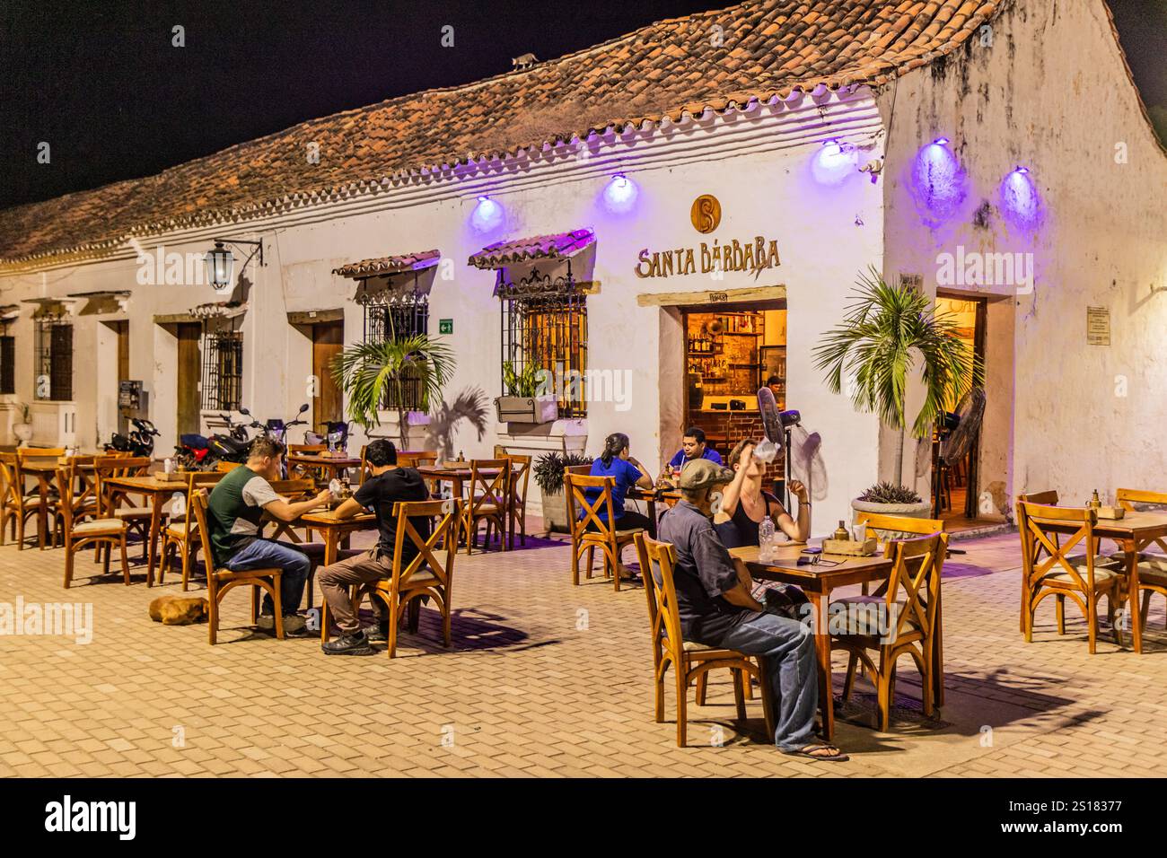MOMPOX, COLOMBIA - MARCH 1, 2023: Night view of riverside restaurants ...