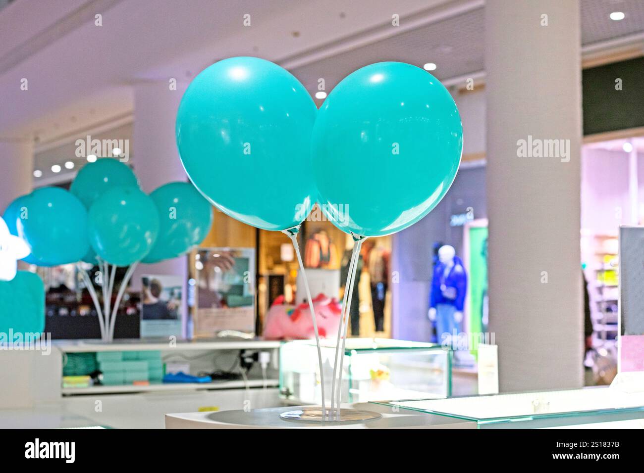 blue balloons in the interior of the mall Stock Photo - Alamy