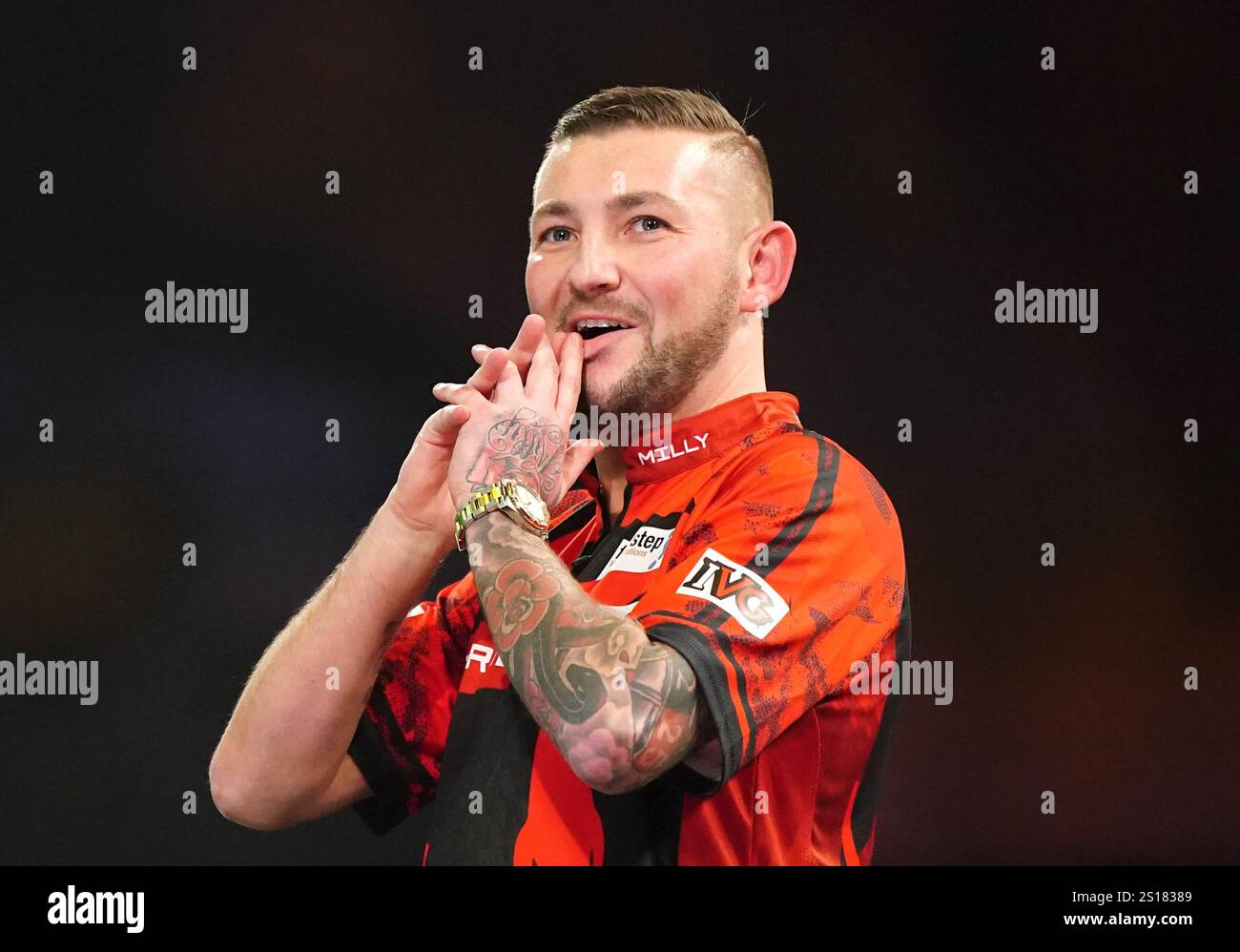 Nathan Aspinall reacts in the quarter-final match against Luke Littler ...