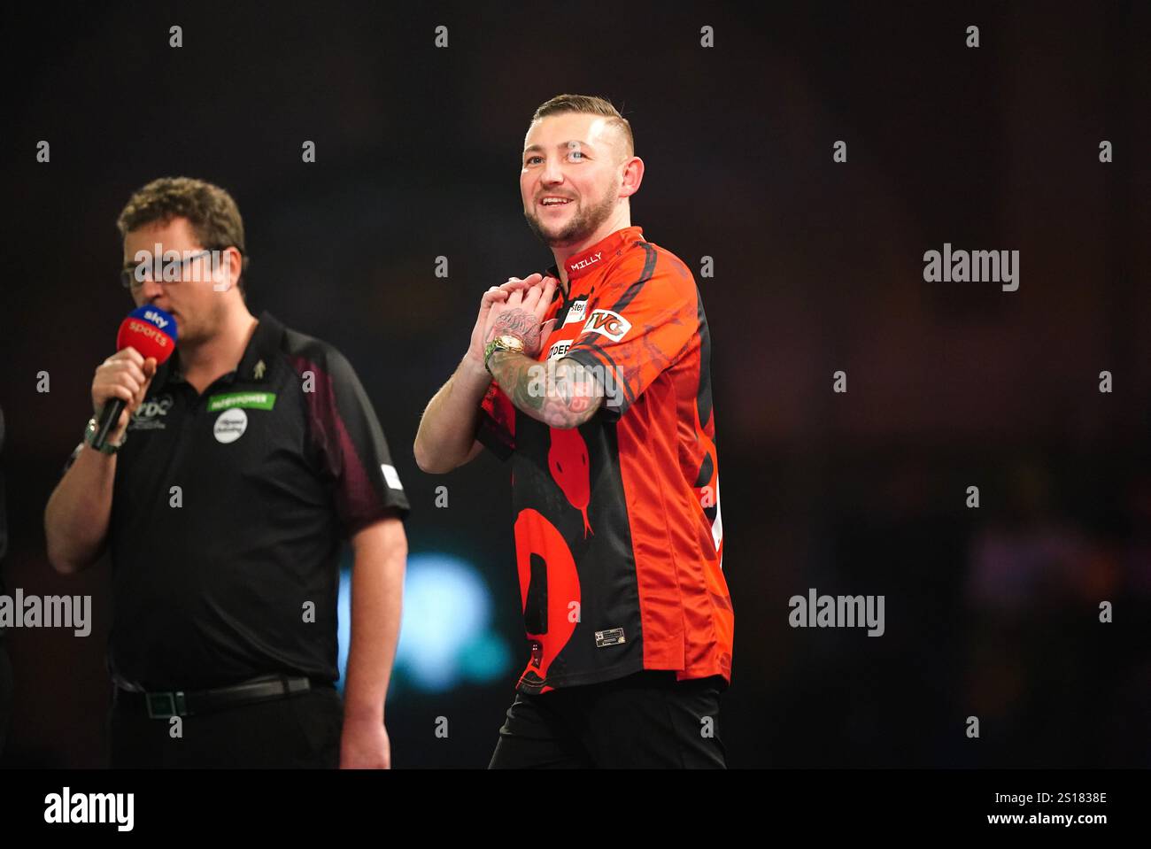Nathan Aspinall reacts in the quarter-final match against Luke Littler ...