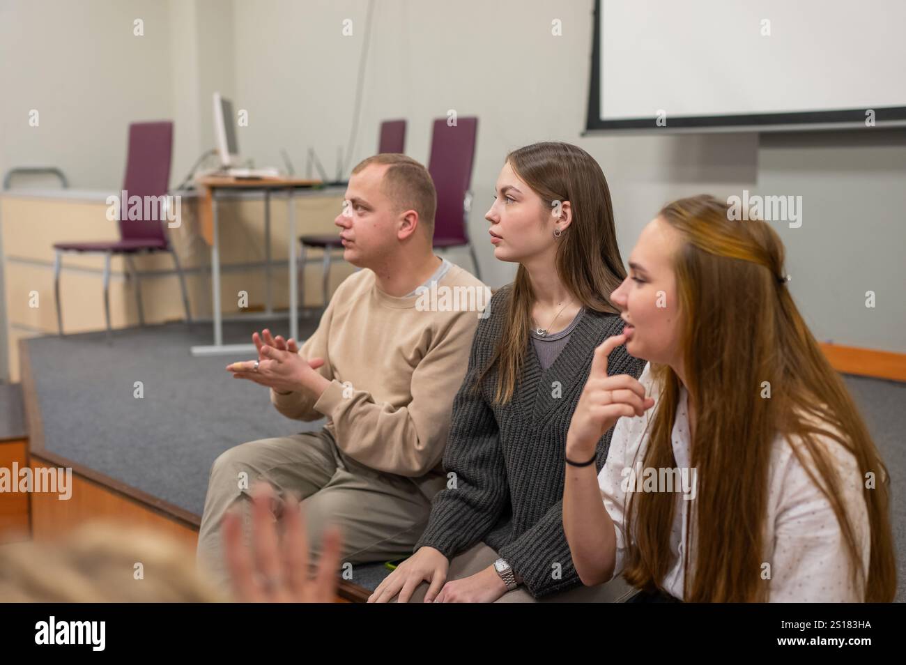Students learn sign language at university Stock Photo - Alamy