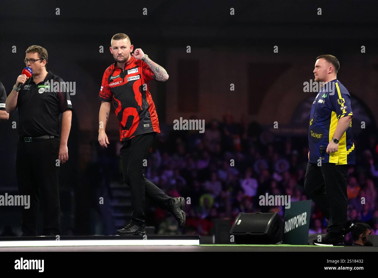 Nathan Aspinall and Luke Littler in their quarter-final match during ...