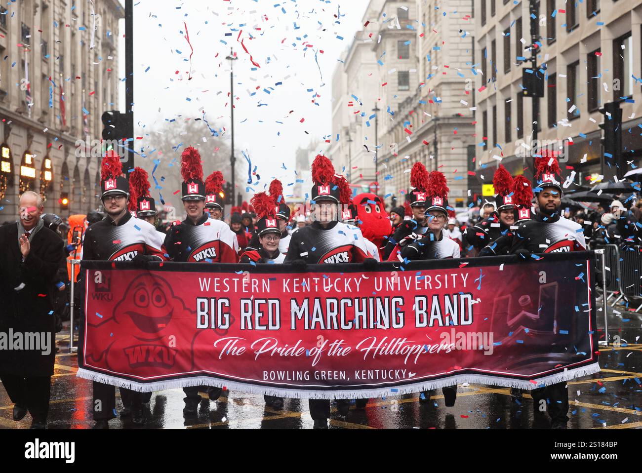 London, UK 1st January 2025.Revellers braved heavy rain to watch London ...