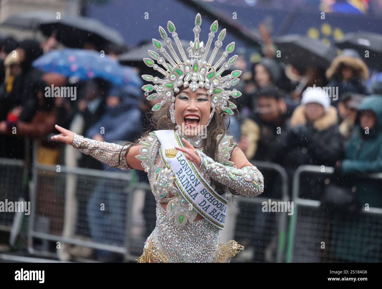 London, UK 1st January 2025.Revellers braved heavy rain to watch London ...