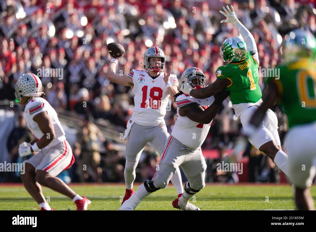 Ohio State quarterback Will Howard (18) throws as Oregon defensive end ...