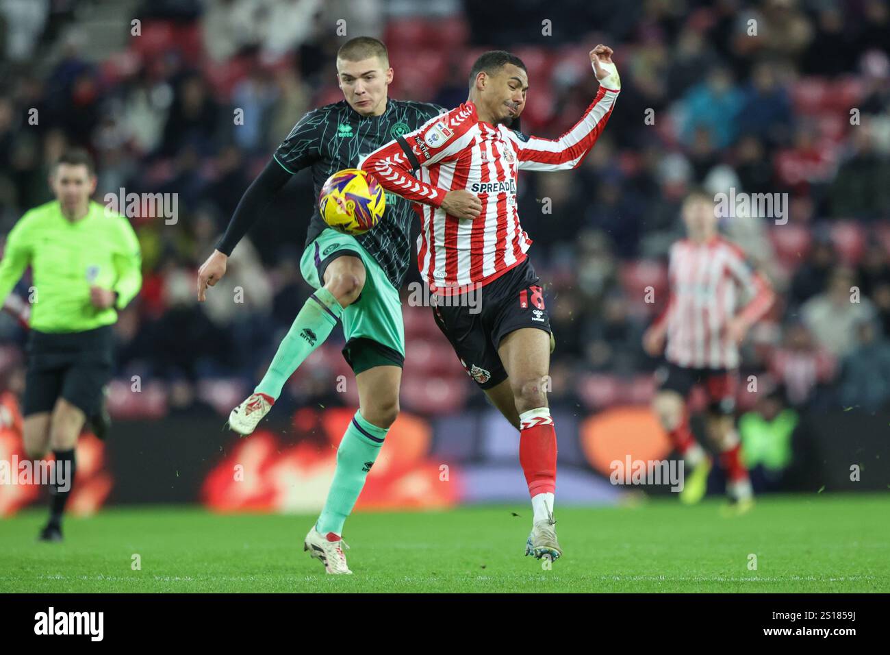 Sunderland, UK. 01st Jan, 2025. Alfie Gilchrist of Sheffield United and Wilson Isidor of ...