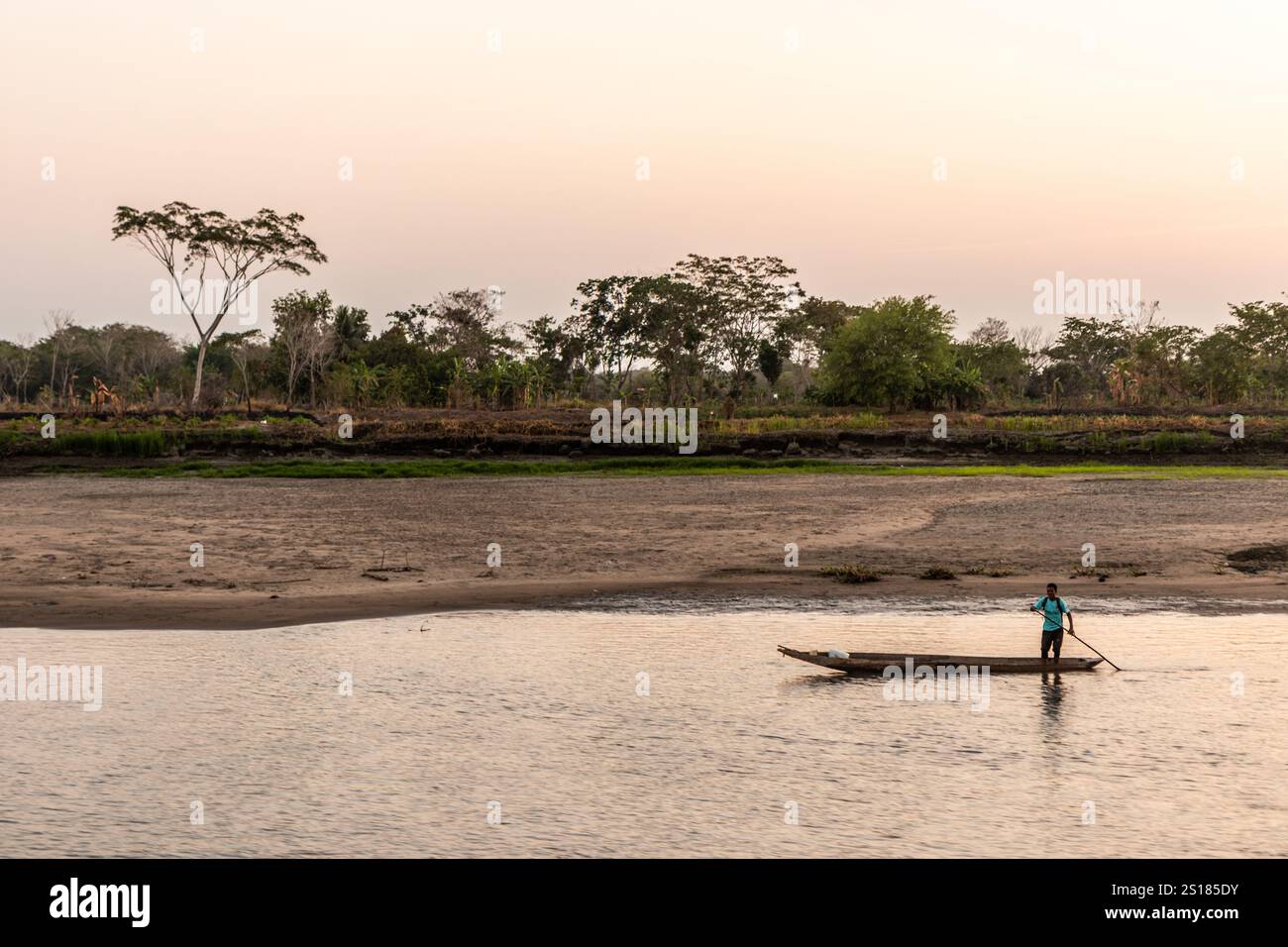 MOMPOX, COLOMBIA - MARCH 3, 2023: Local man on a boat on Magdalena ...
