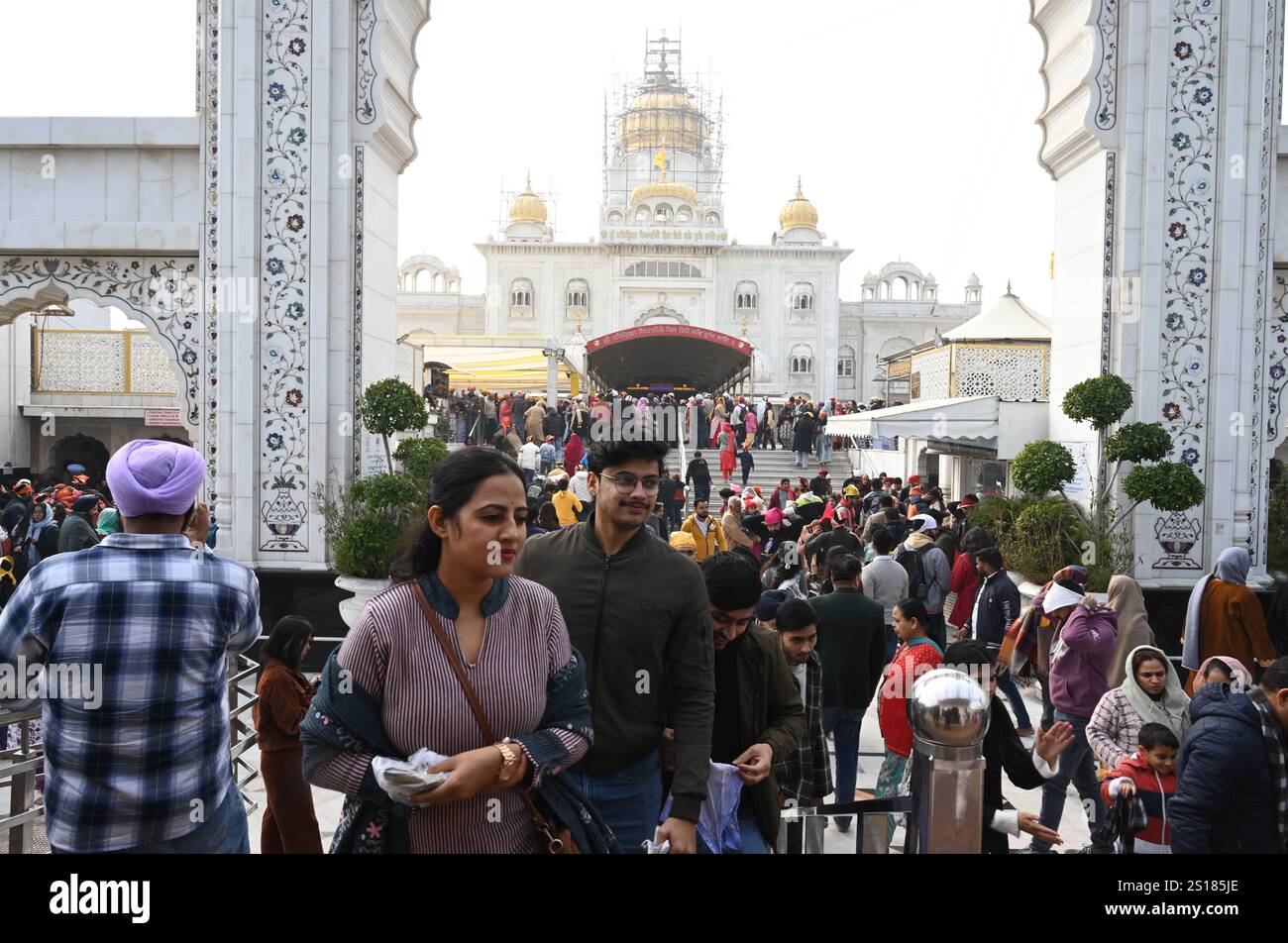 NEW DELHI, INDIA - JANUARY 1: Devotees visit Bangla Sahib gurudwara to offer prayers on the ...