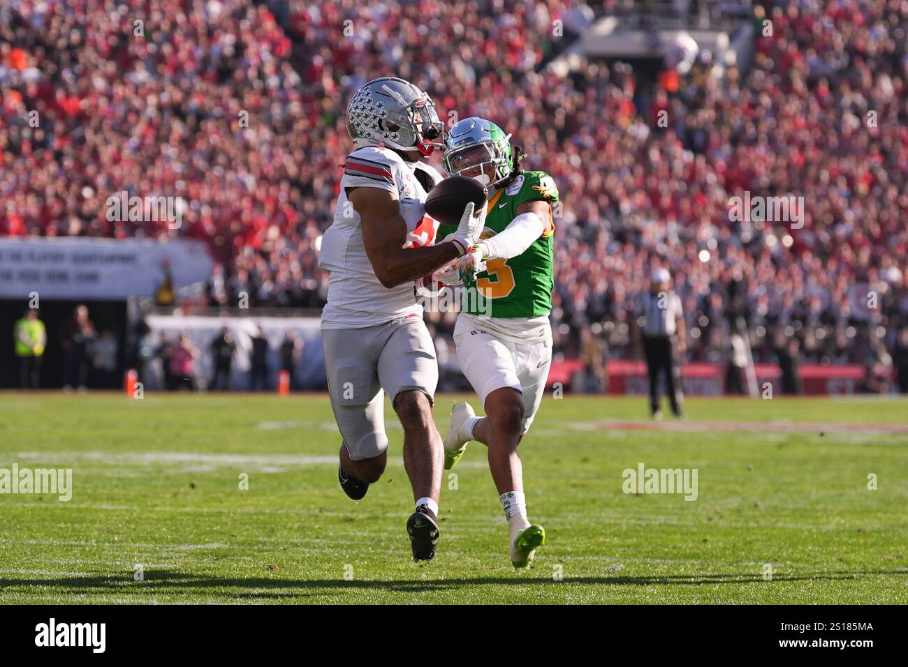 Ohio State wide receiver Emeka Egbuka (2) catches a touchdown pass as ...