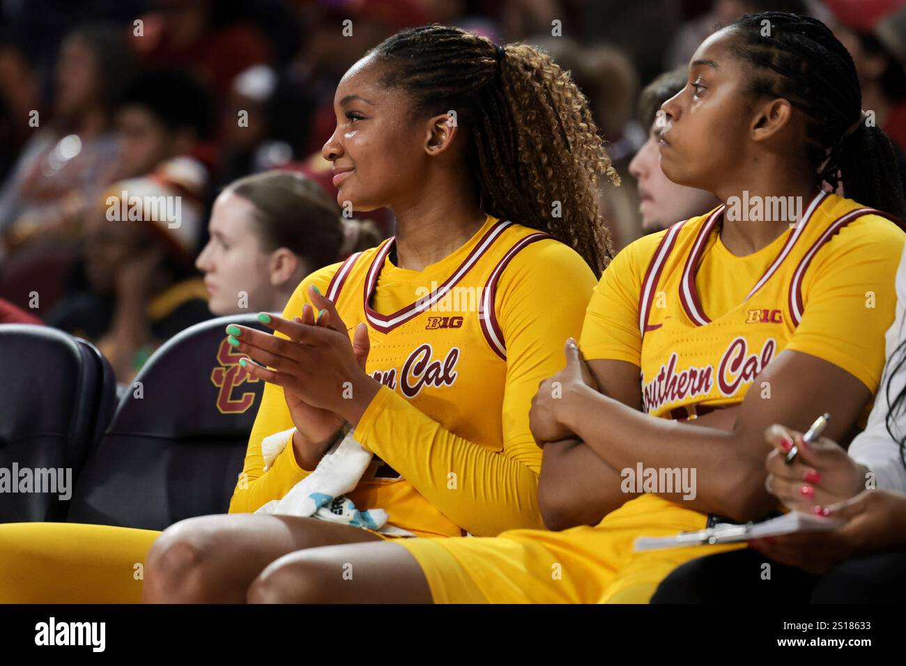 Southern California forward Kiki Iriafen (44) gestures on the bench as ...