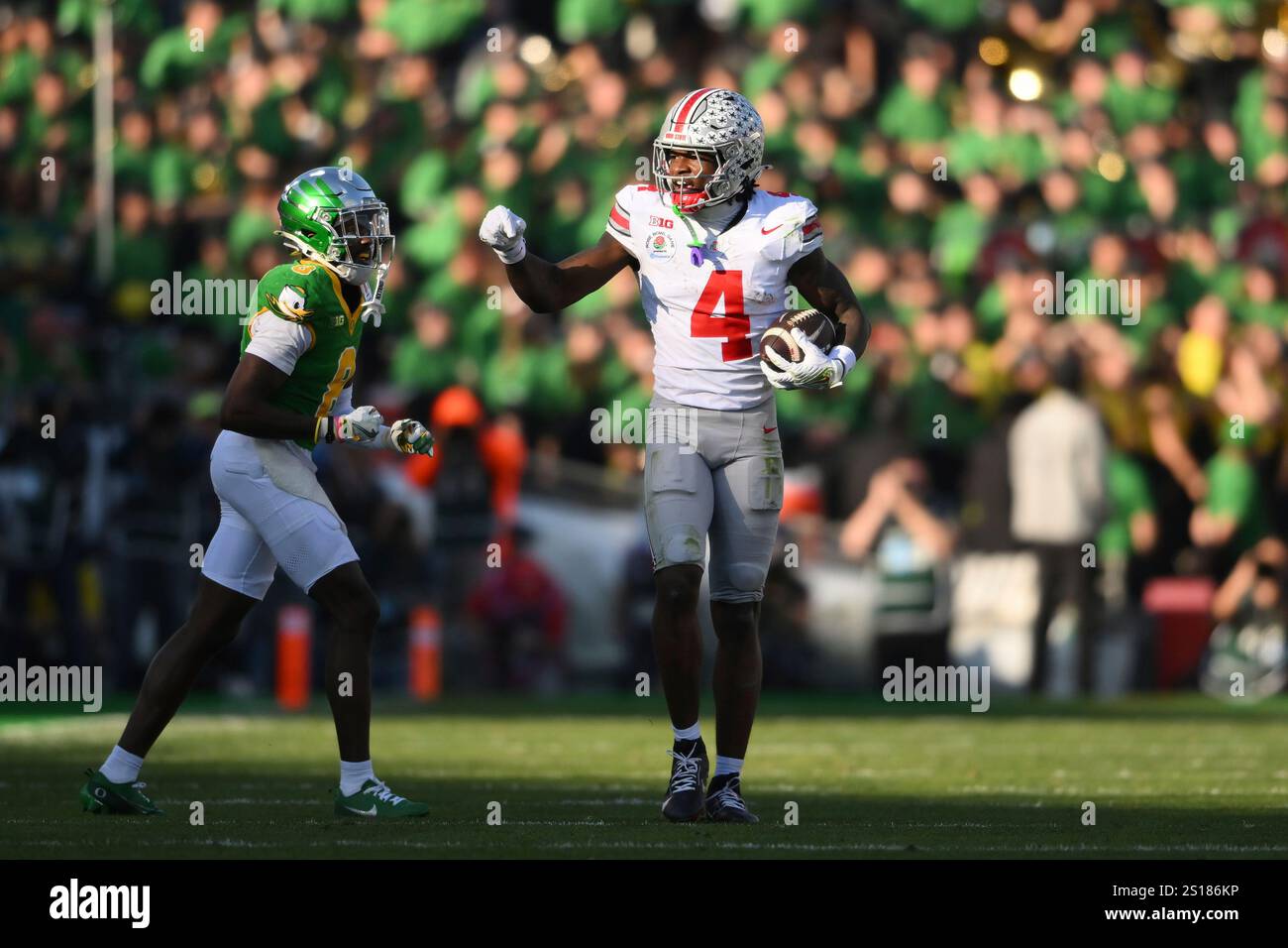 Ohio State wide receiver Jeremiah Smith (4) celebrates his catch ...