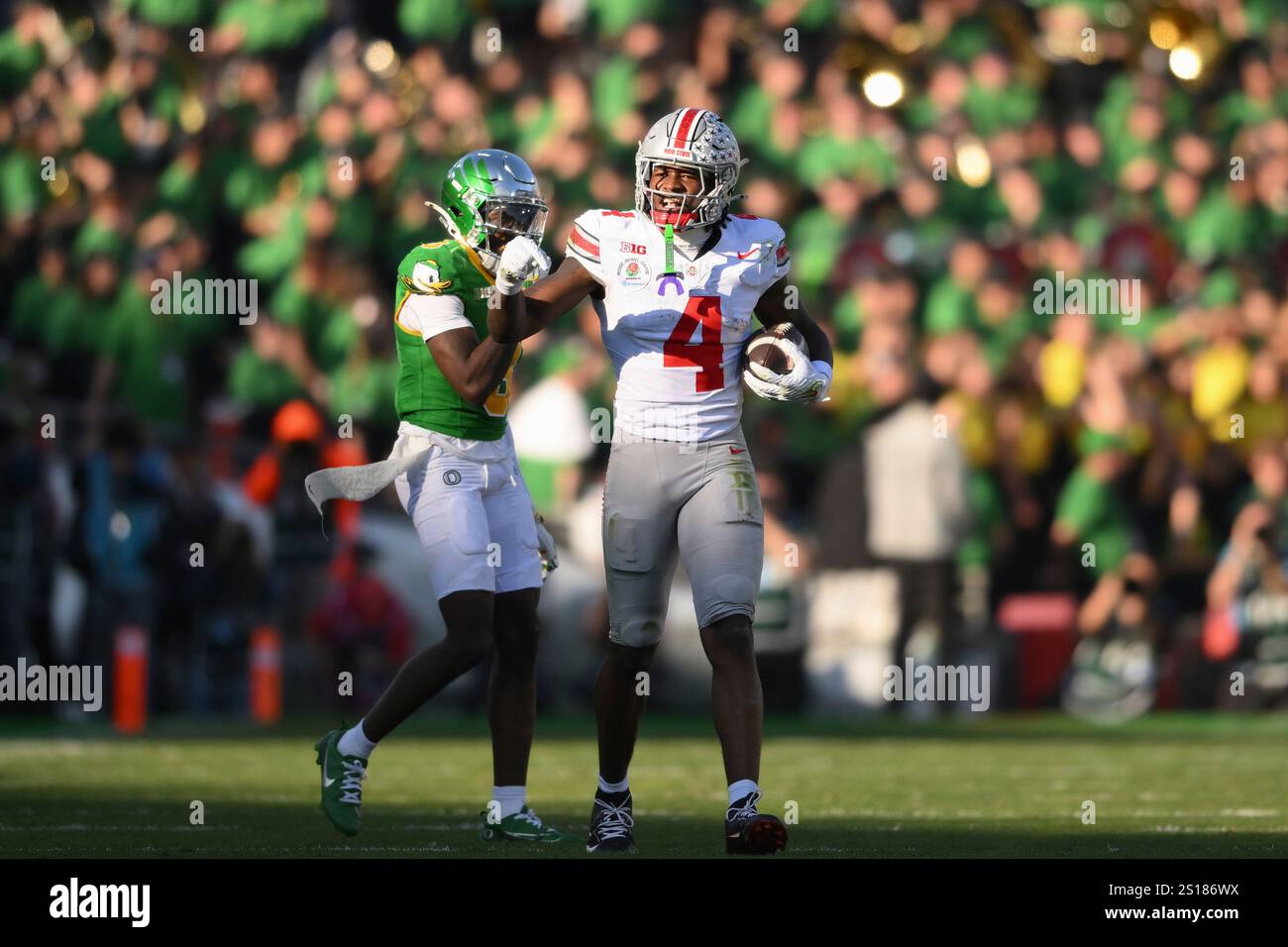 Ohio State wide receiver Jeremiah Smith (4) celebrates his catch ...