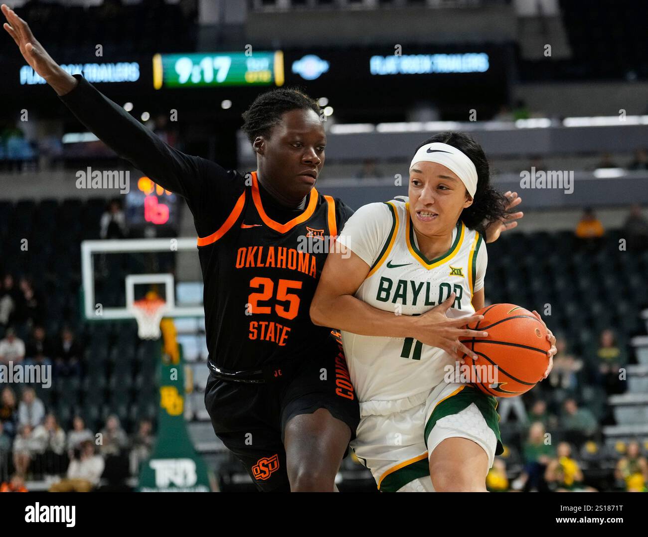 Baylor guard Jada Walker drives on Oklahoma State guard Alexia Smith in ...