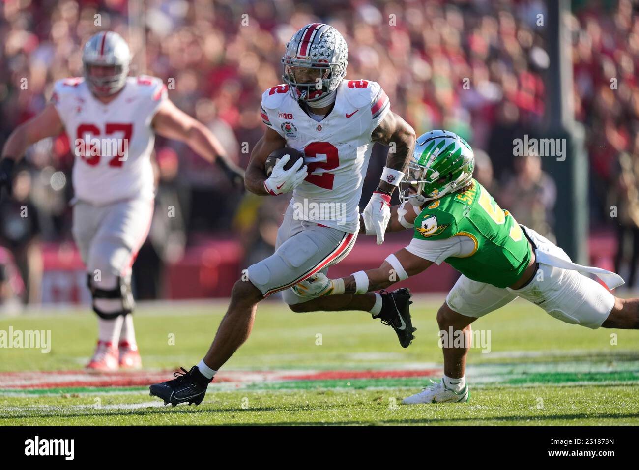 Ohio State wide receiver Emeka Egbuka (2) carries the ball against ...