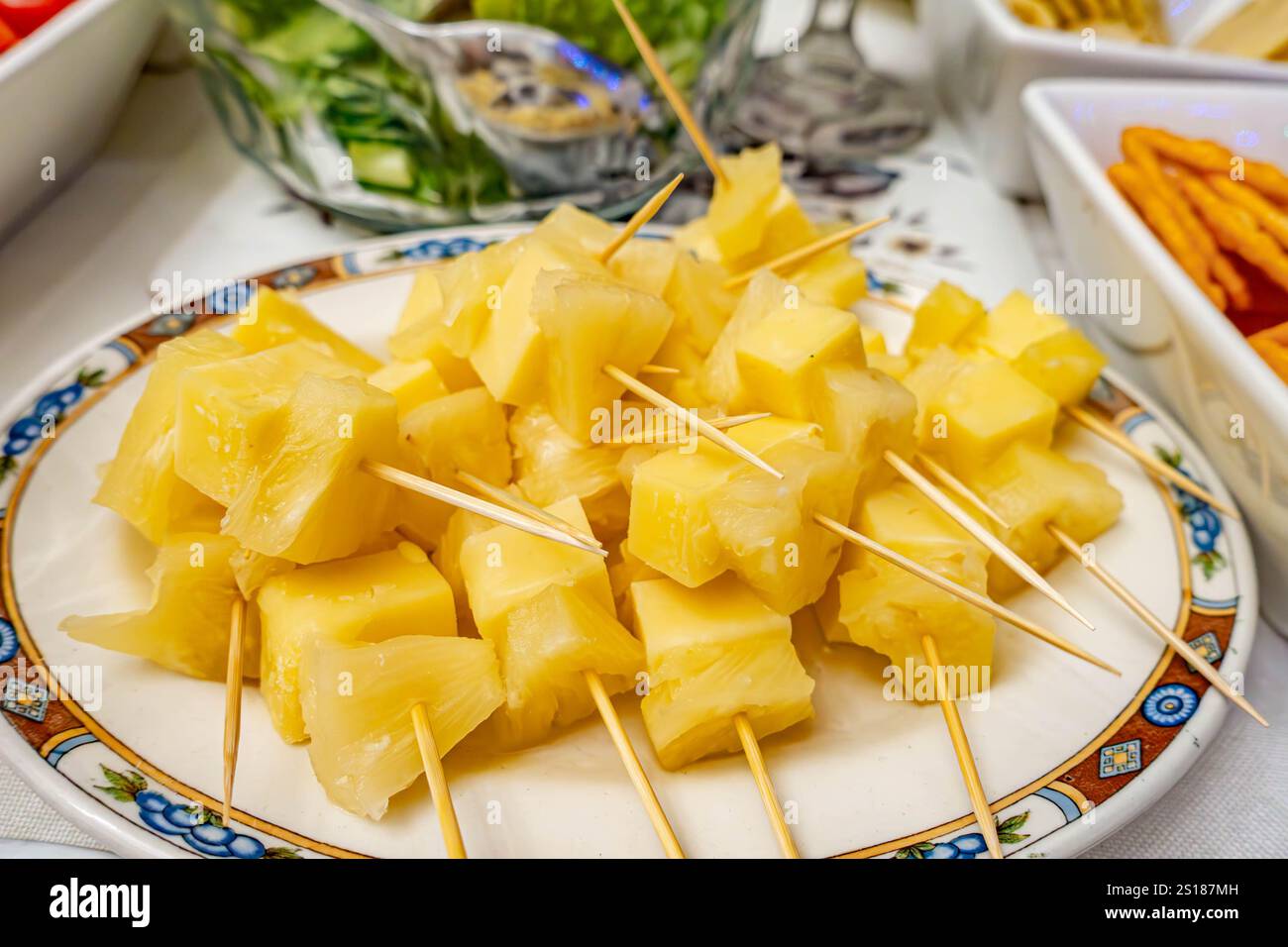 Cheese and pineapple on sticks is a popular party buffet food in The UK ...