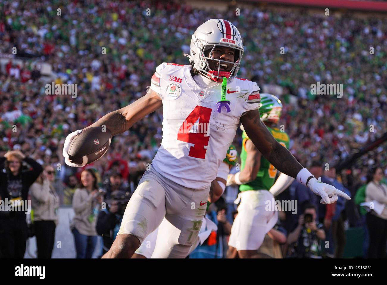 Ohio State wide receiver Jeremiah Smith (4) celebrates his touchdown ...