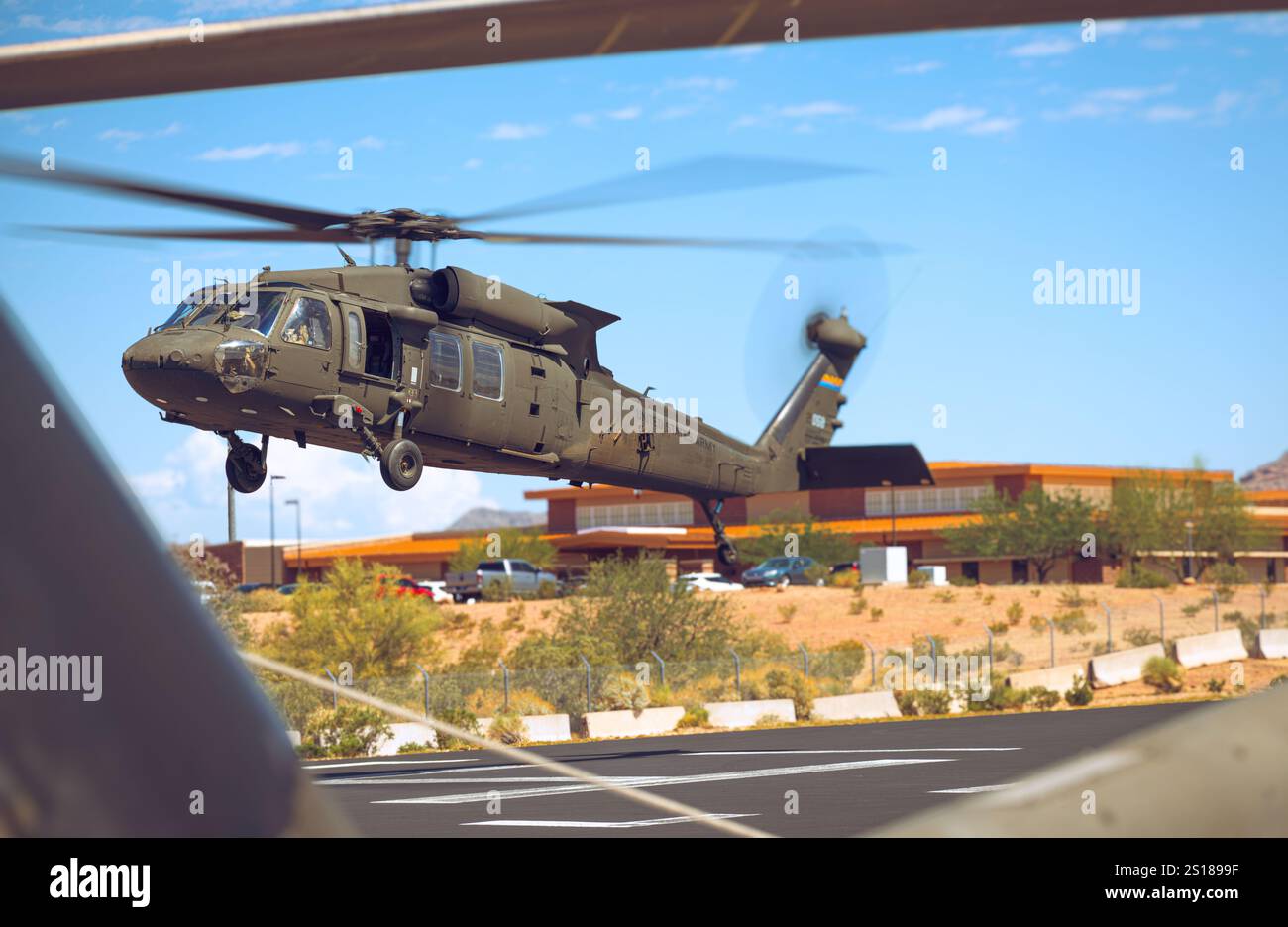 U.S. Army Soldiers of the Arizona National Guard (AZNG) lift off for a ...