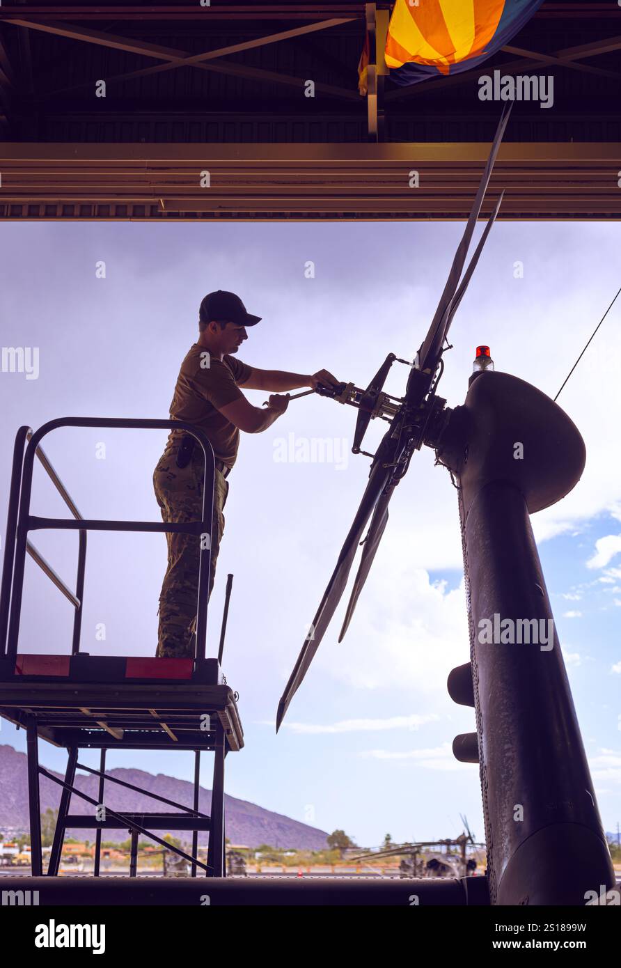 A U.S. Army Soldier of the Arizona National Guard (AZNG) works on the ...
