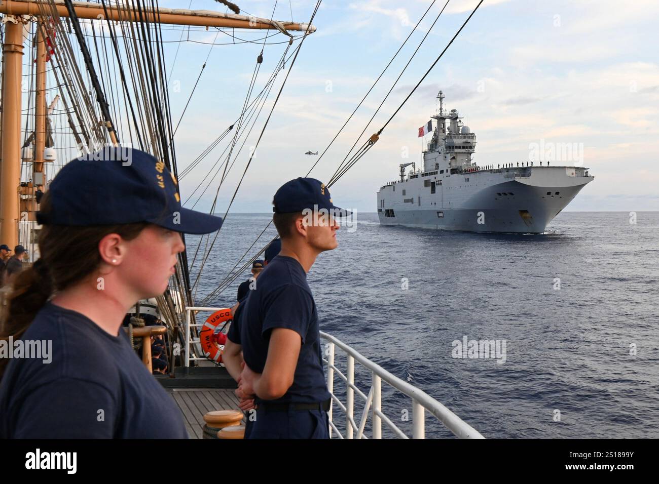 The crews of the Coast Guard Cutter Eagle (WIX 327) and French navy ...