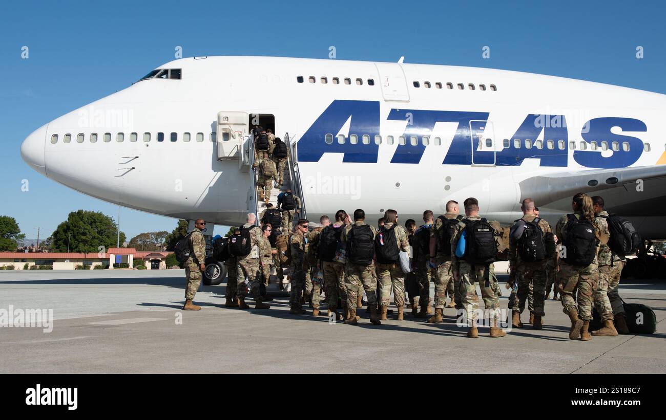 U.S. Airmen board an aircraft prior to an Air Force Force Generation ...