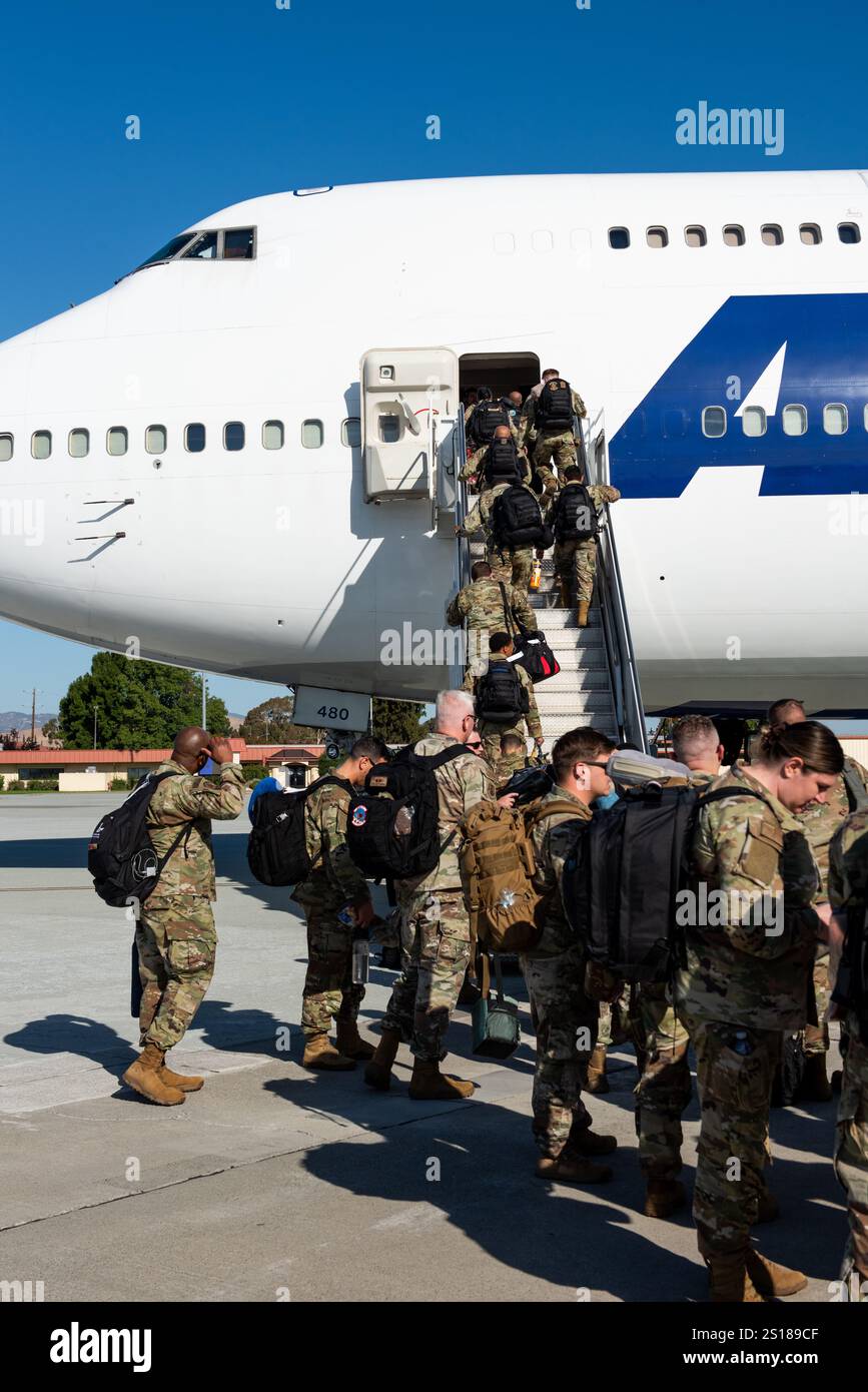 U.S. Airmen board an aircraft prior to an Air Force Force Generation ...