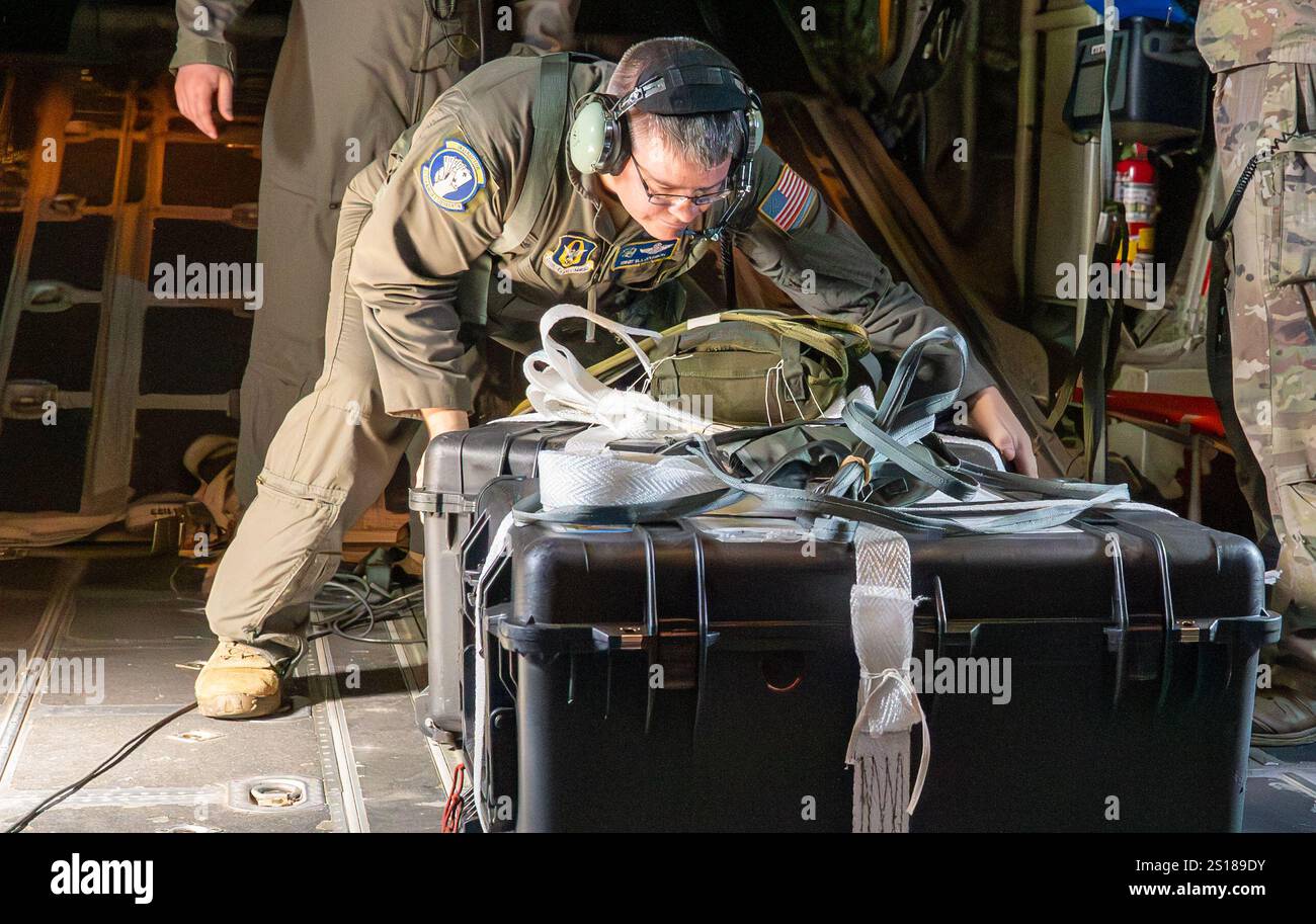 U.S. Air Force Master Sgt. Derek Johnson, instructor loadmaster with ...