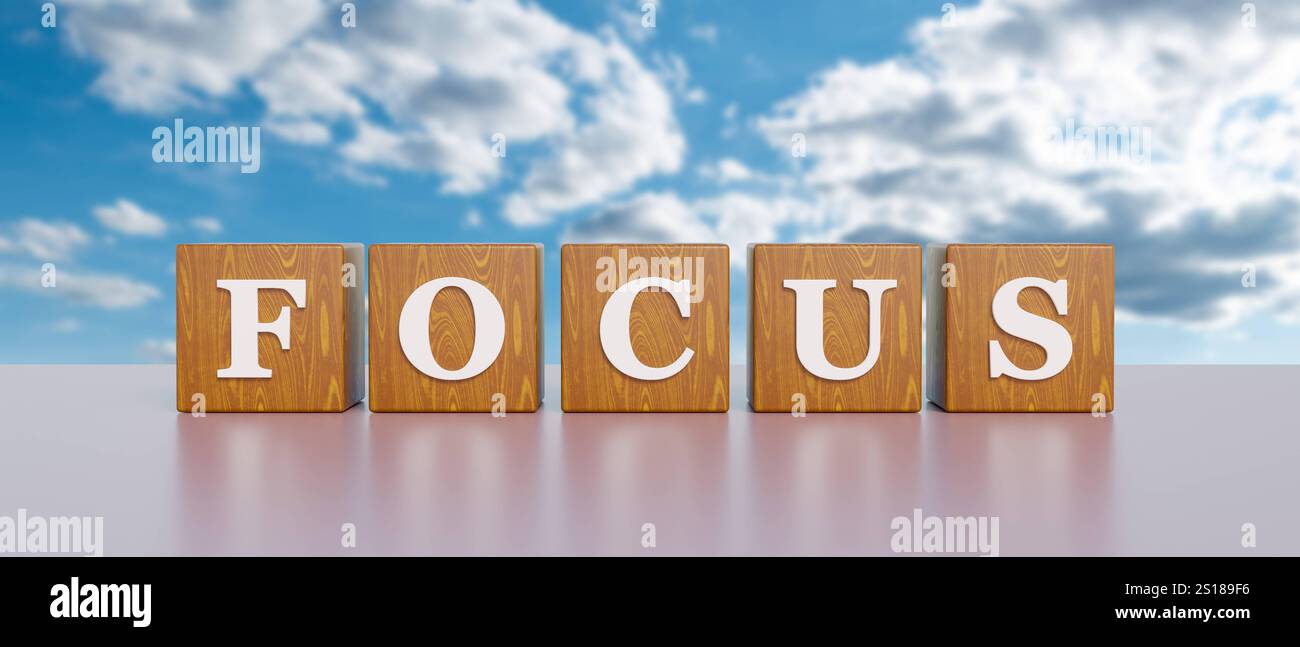 Focus. Focus. Wooden dices with white capital letters and the word ...