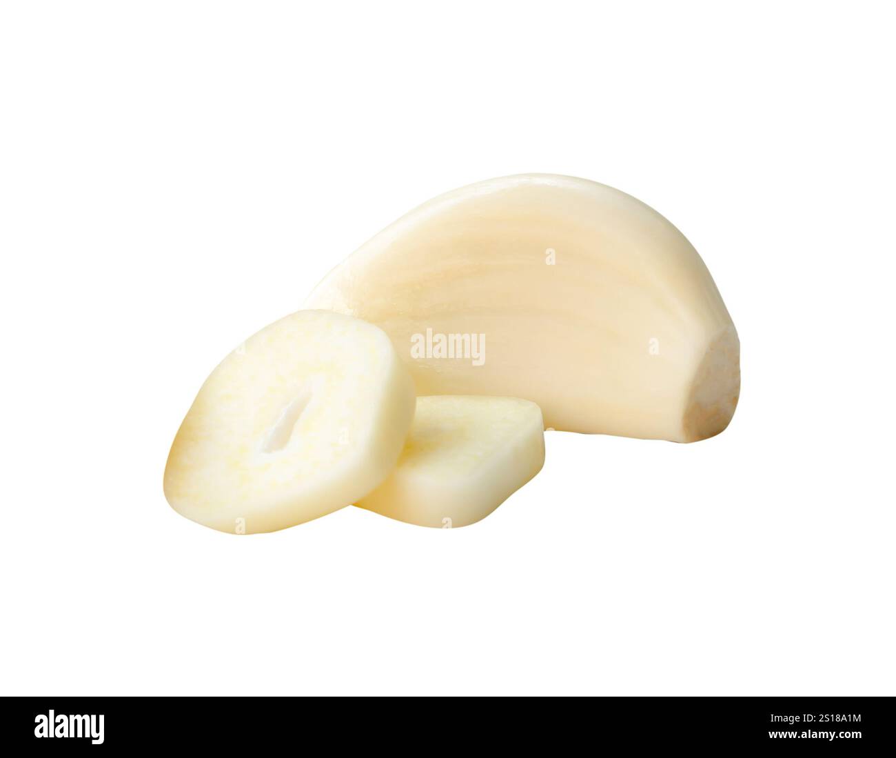Side view of peeled garlic cloves with slices in stack is isolated on ...