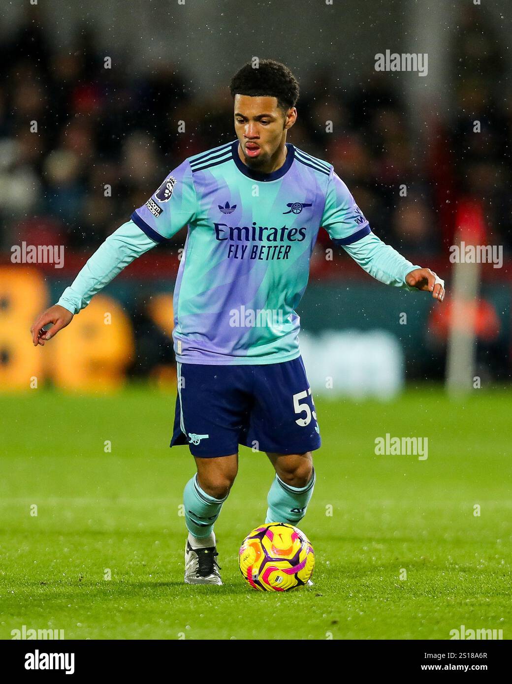 Ethan Nwaneri of Arsenal runs with the ball during the Premier League ...