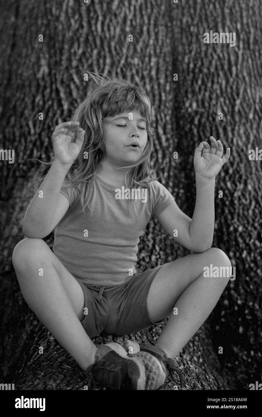 Cute child meditating. Freedom concept. Peaceful kids meditation. Child ...