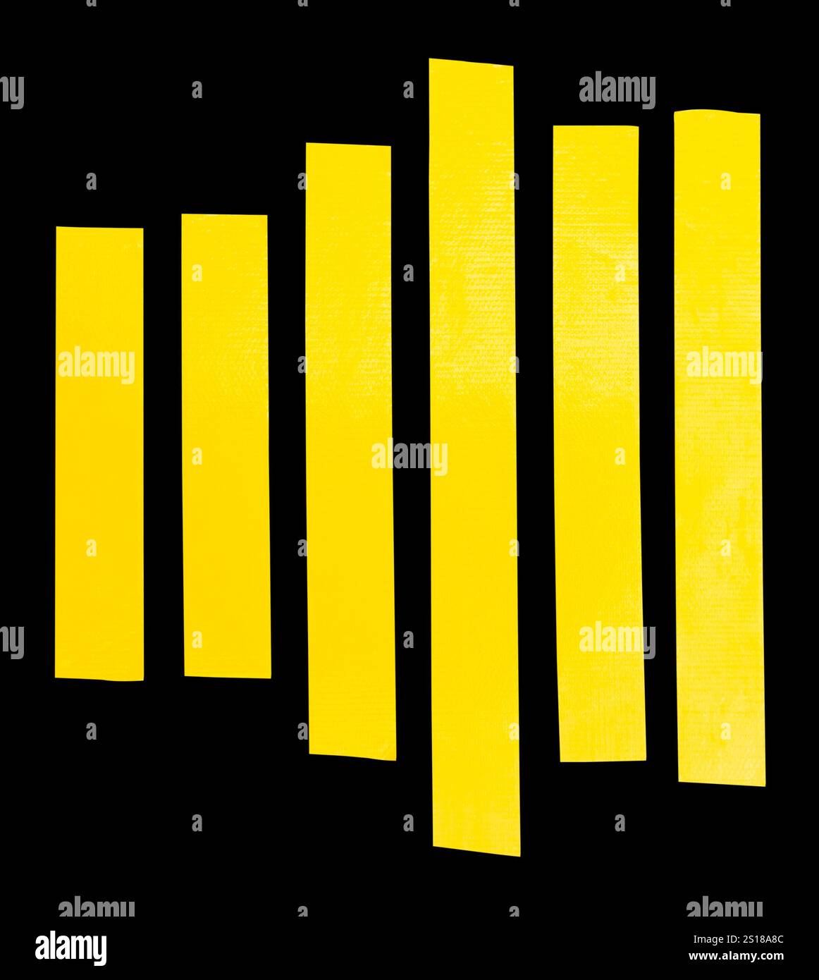 Top view set of tidy straight yellow adhesive vinyl tape or cloth tape ...
