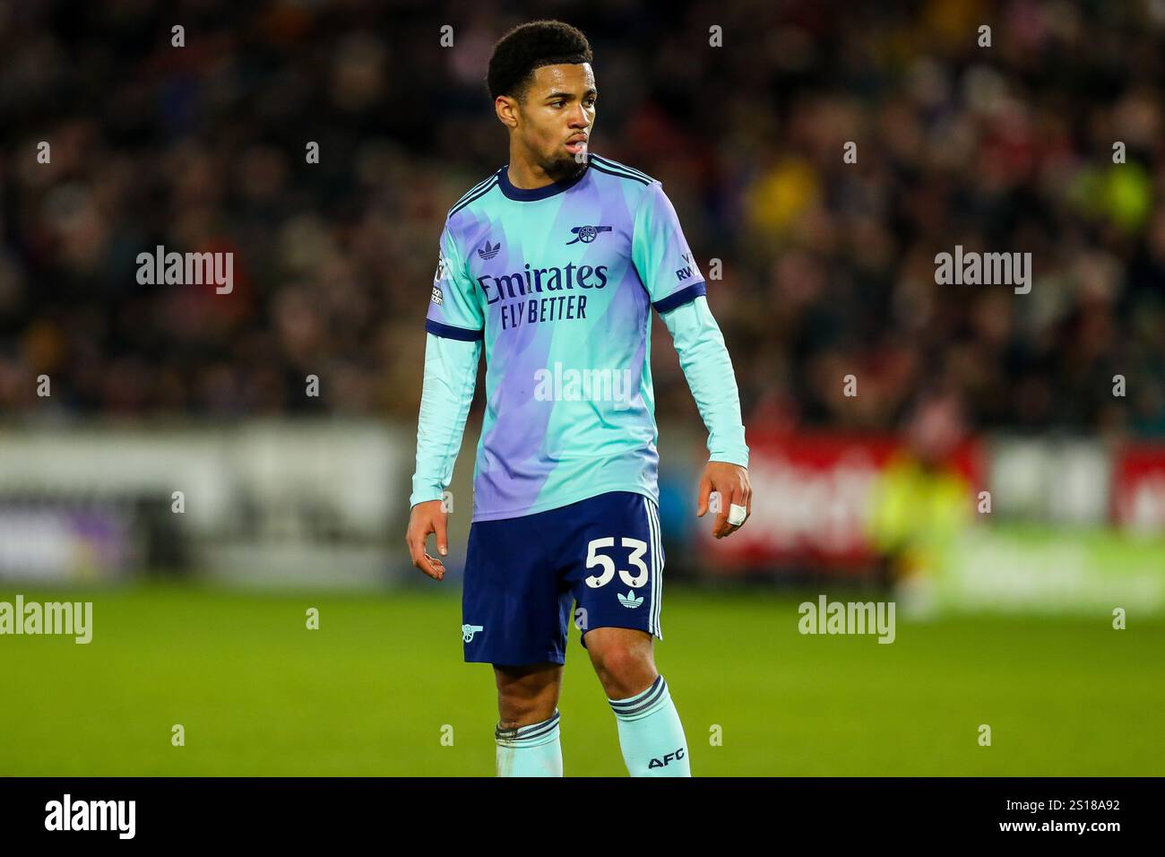 Ethan Nwaneri of Arsenal looks on during the Premier League match ...