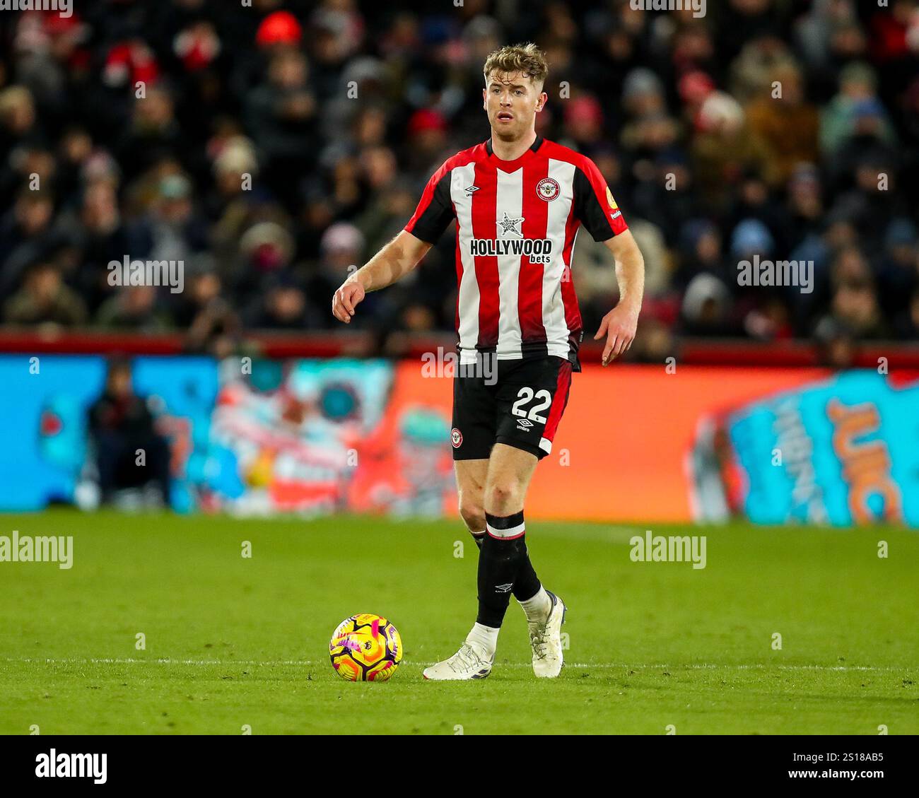 Nathan Collins of Brentford runs with the ball during the Premier ...