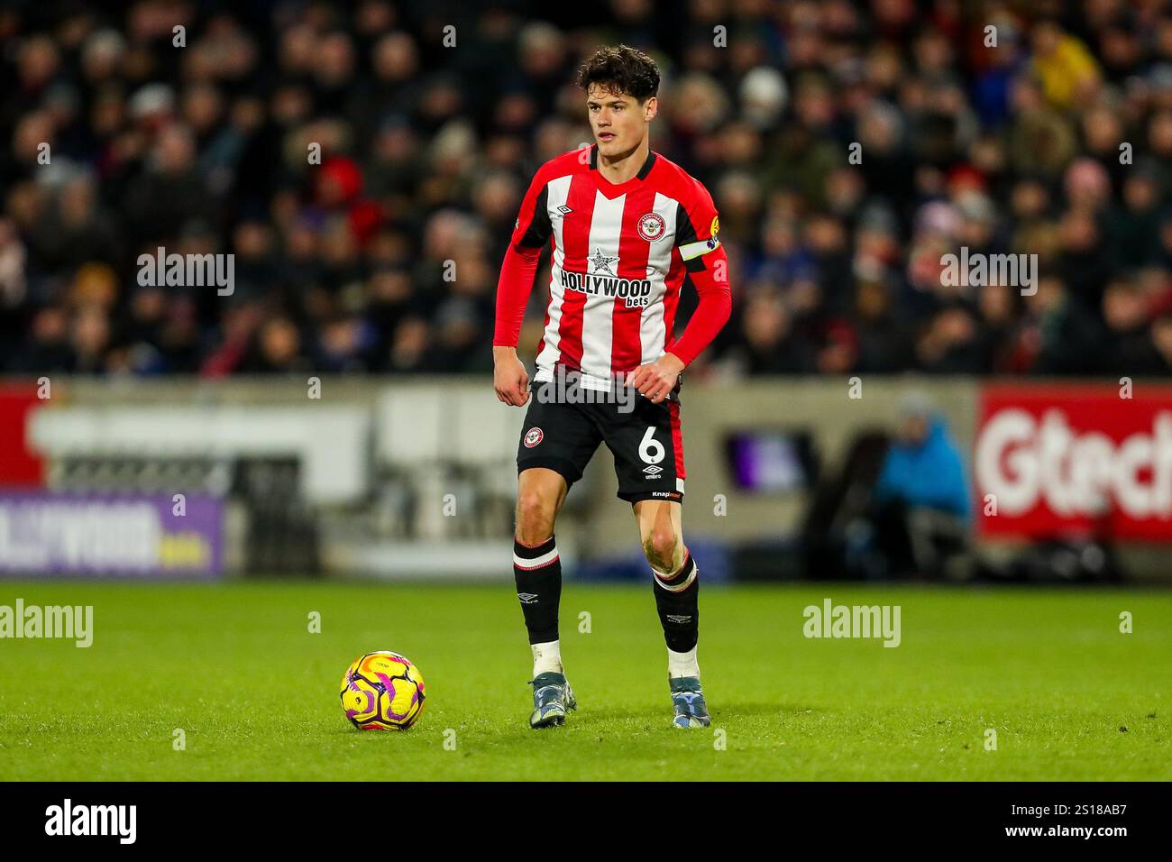 Christian Norgaard of Brentford runs with the ball during the Premier ...