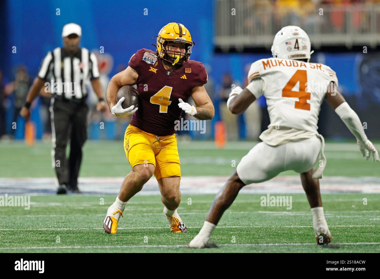 ATLANTA, GA - JANUARY 01: Running Back Cam Skattebo #4 of the Arizona ...