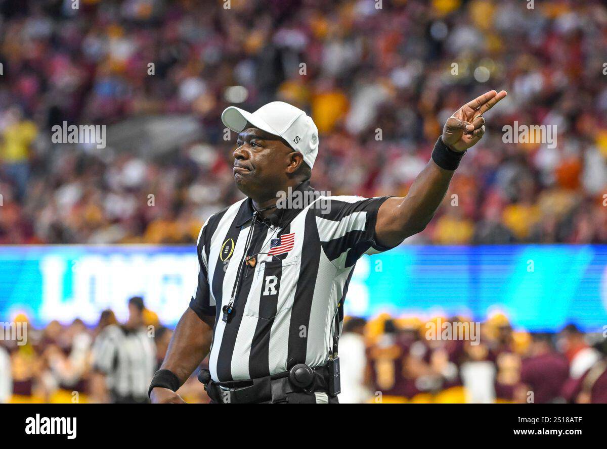 ATLANTA, GA - JANUARY 01: Referee Larry Smith signals first down during ...
