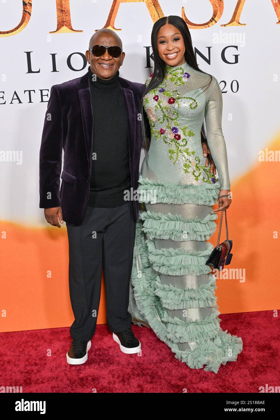 Hollywood, USA. 09th Dec, 2024. Lebo M and Minnie Diamini arriving to ...
