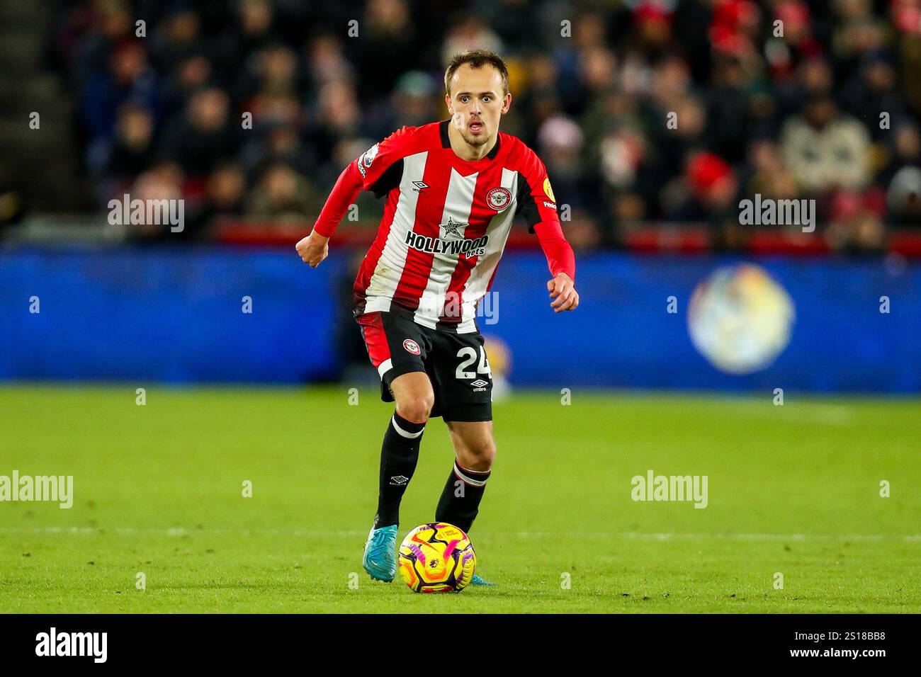 London, UK. 01st Jan, 2025. Mikkel Damsgaard of Brentford runs with the ...